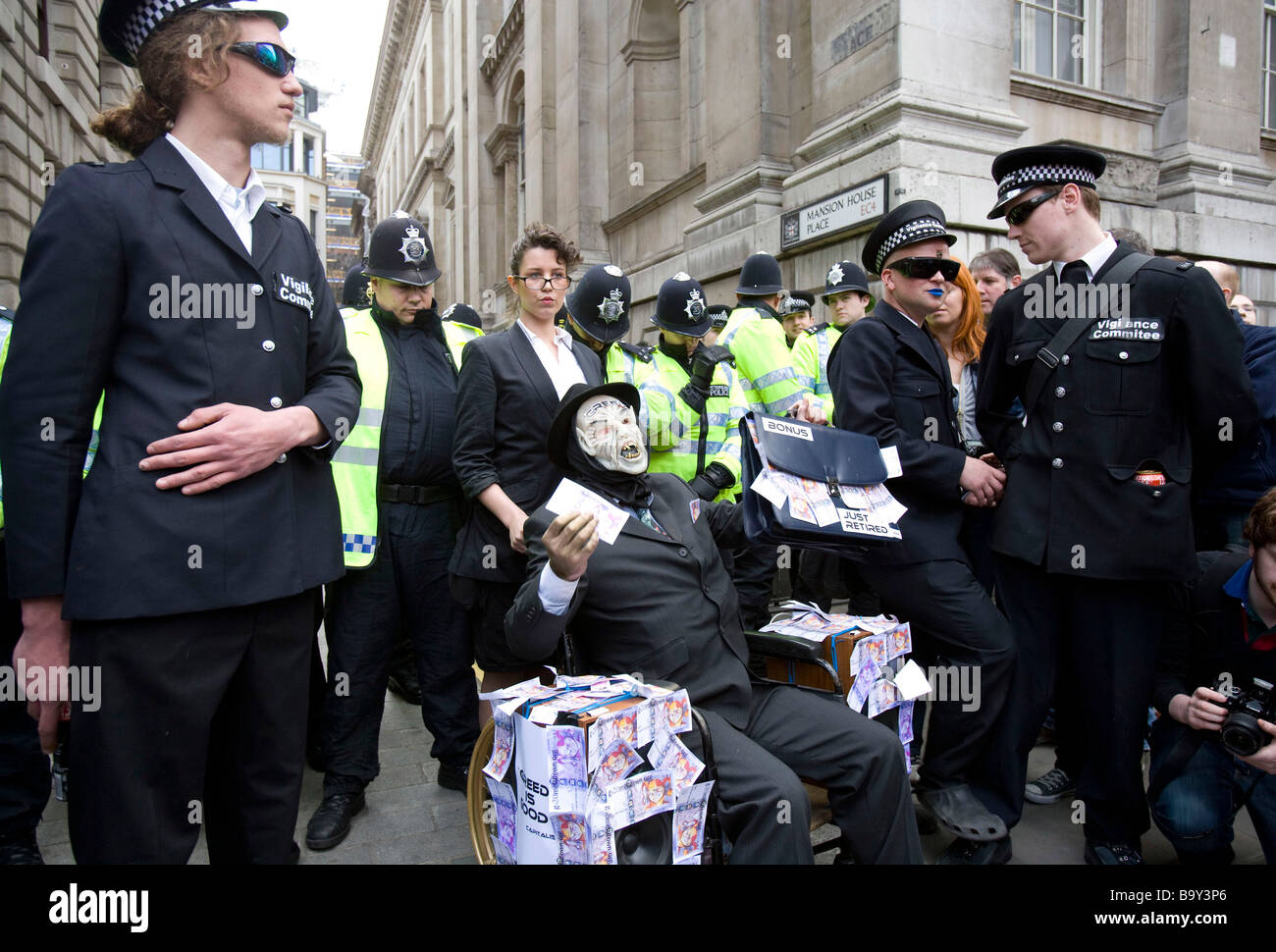 A comedy troupe parody a fat greedy corrupt banker Stock Photo - Alamy