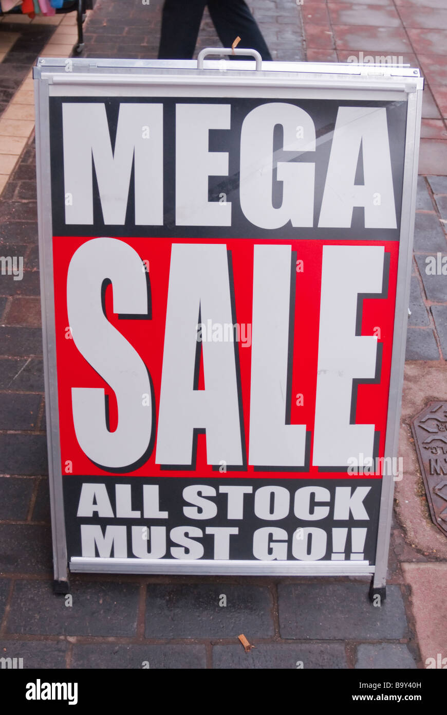 A sign outside a shop store advertising a sale Stock Photo - Alamy