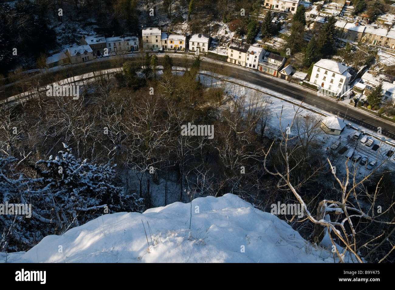 View of snow in Matlock Bath Derbyshire England looking through trees ...