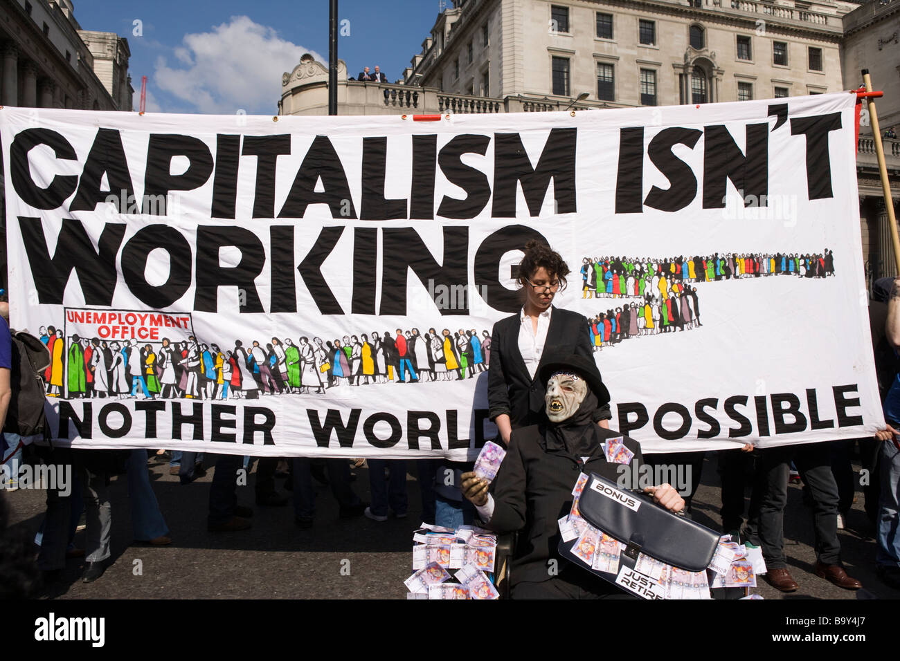 Capitalism isn't working banner. Demonstrators at the Bank of England ...