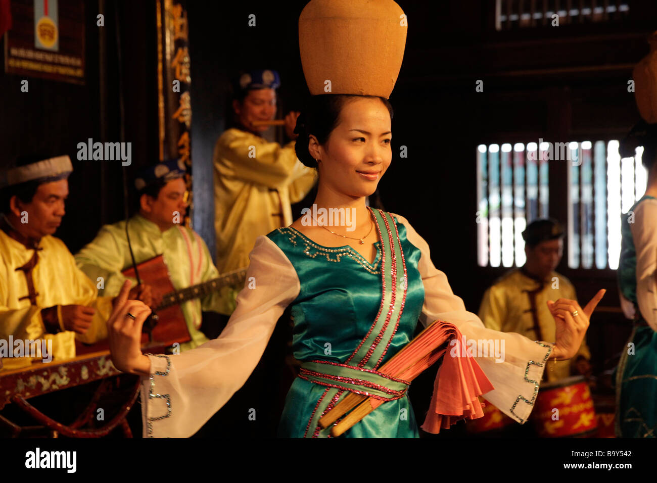 folk songs and folk dances with traditional costumes and instruments in ...