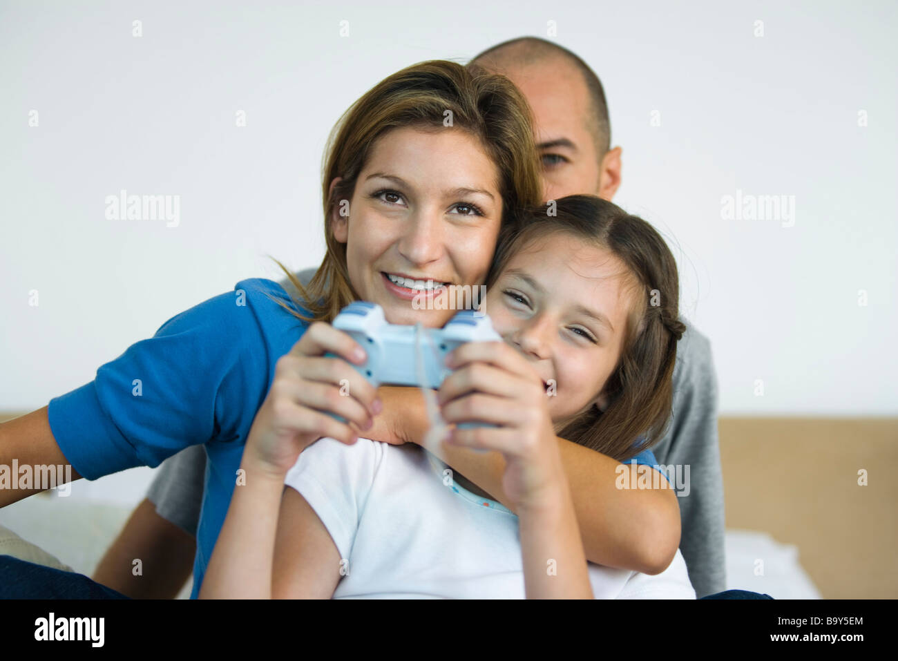 Children playing an early video game hi-res stock photography and ...