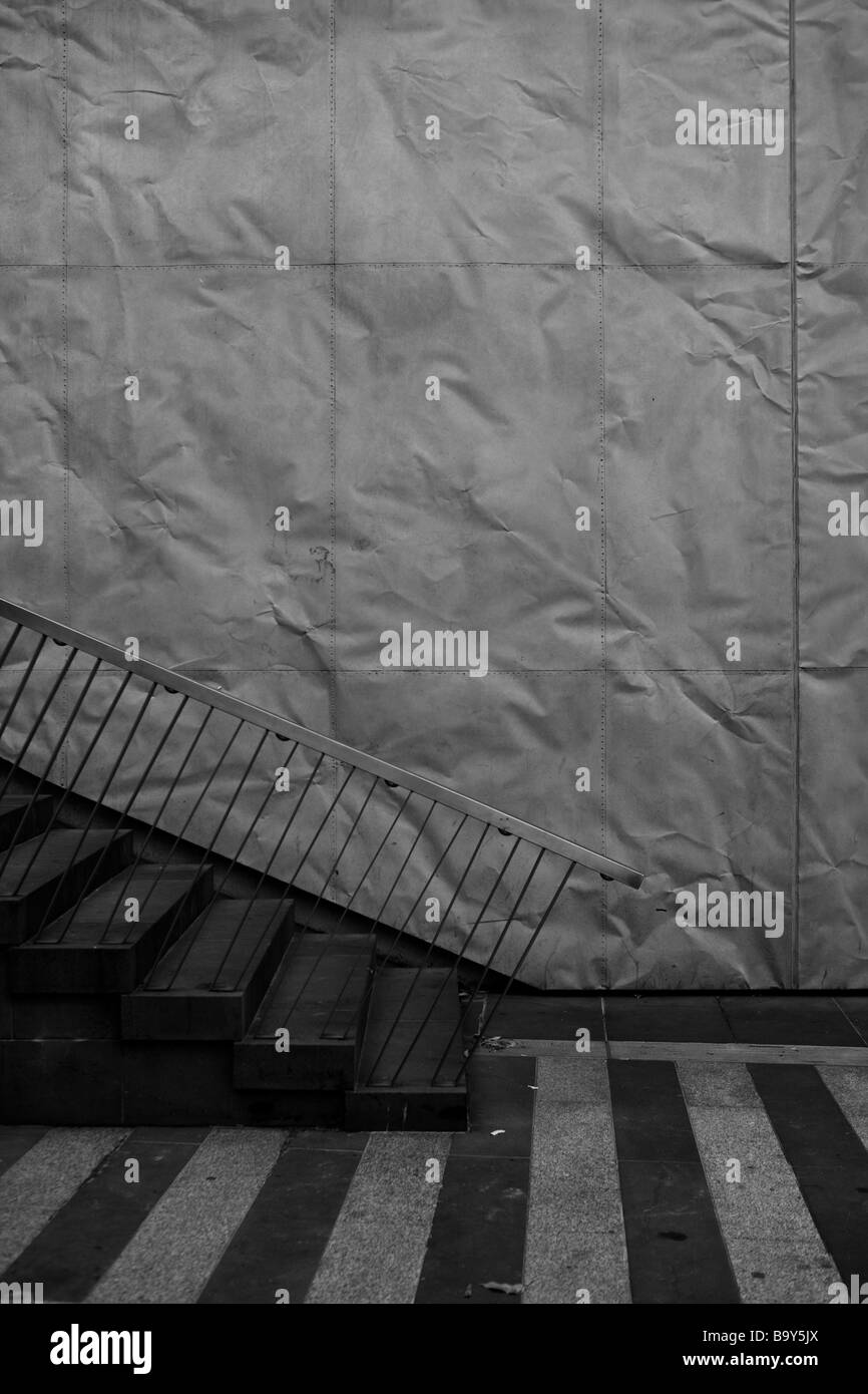 Steps next to the wall Stock Photo - Alamy
