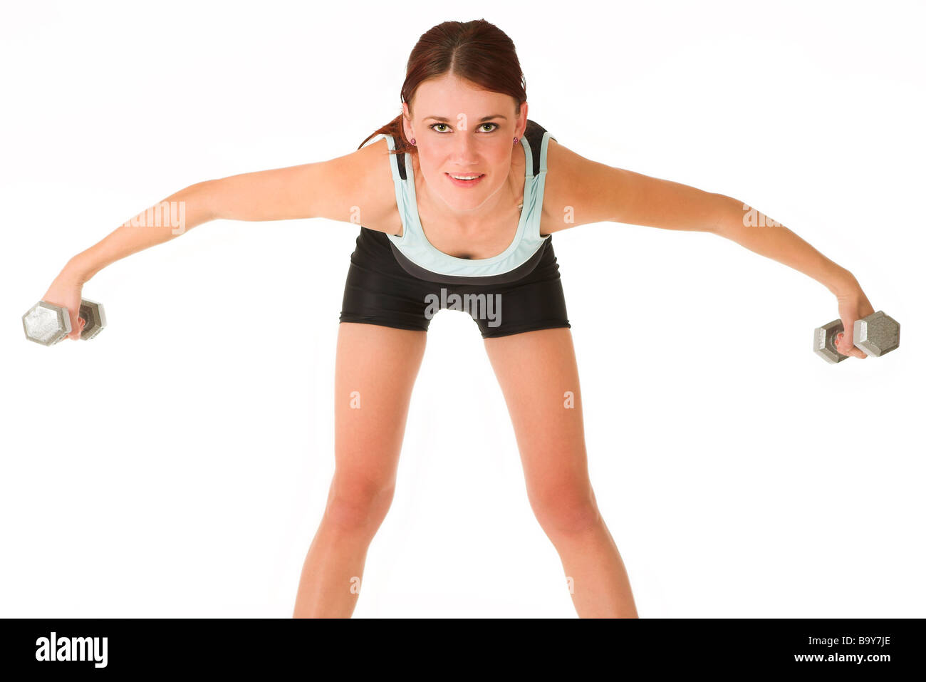 Fit girl exercising in Cut Out Stock Images & Pictures - Alamy