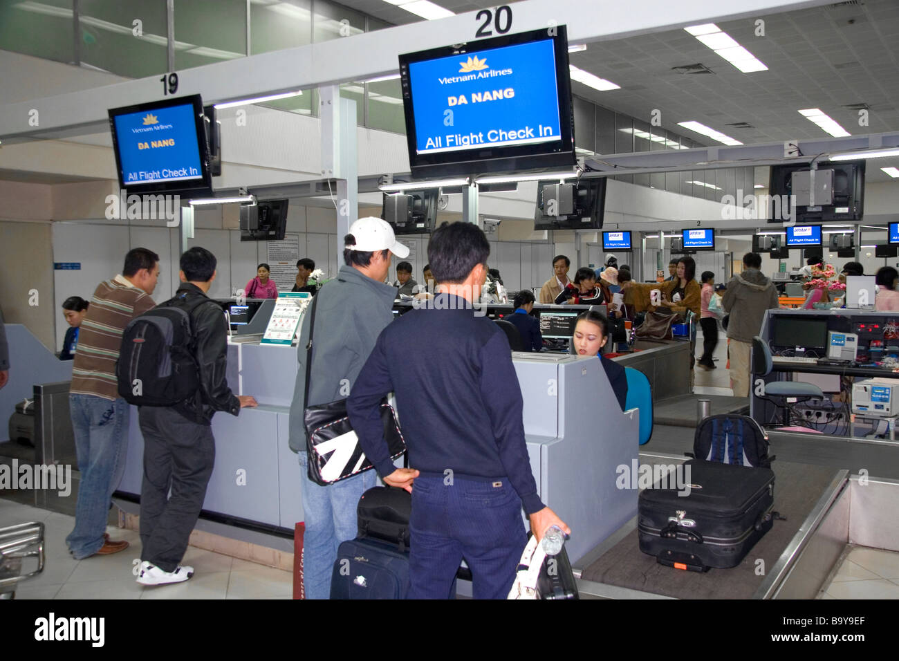 Domestic air passenger check in at the Tan Son Nhat International ...