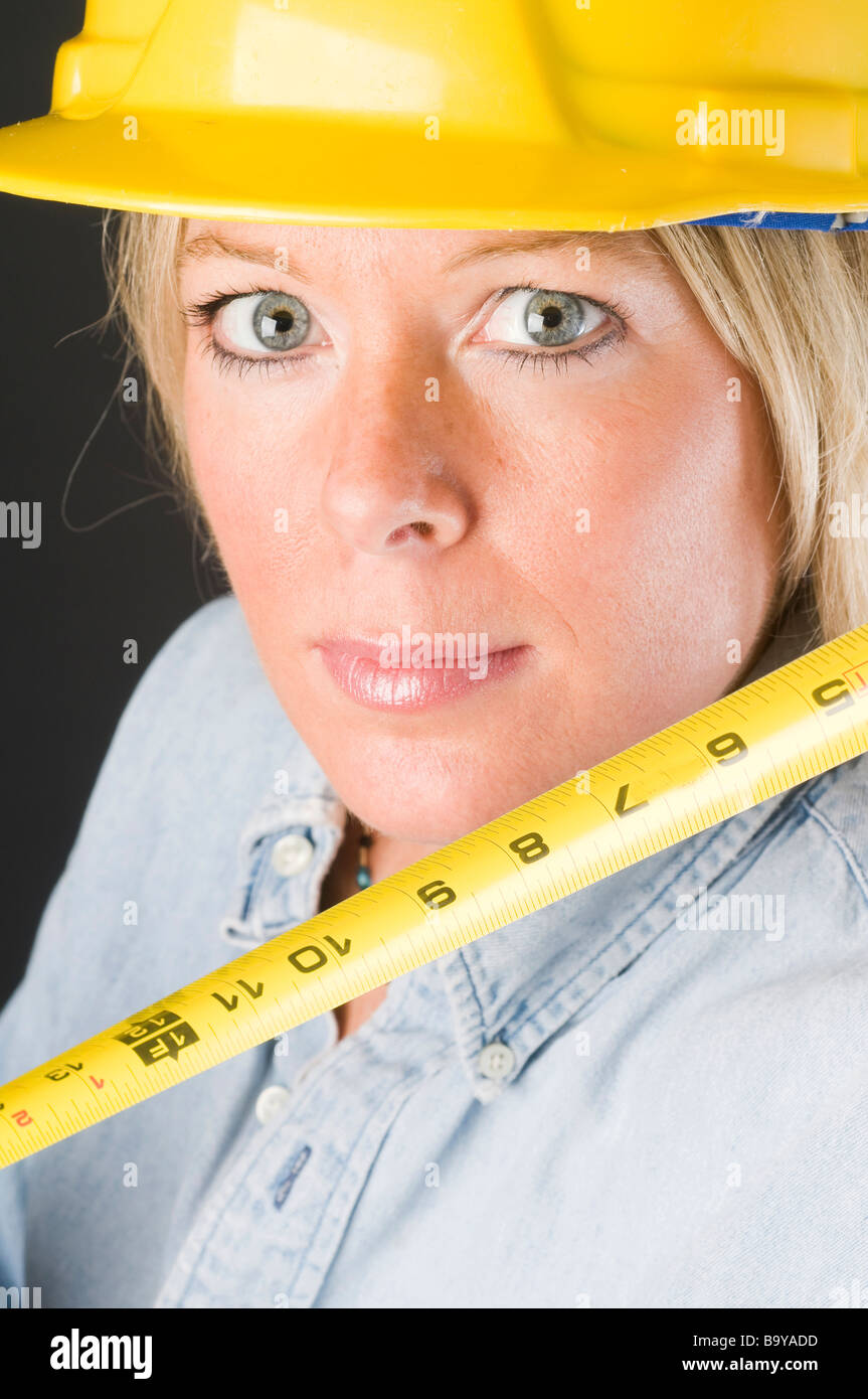 pretty blond female construction worker contractor builder hard hat ...