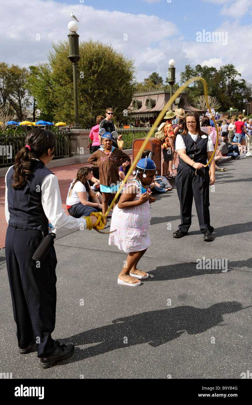 Child with Mouse Ears jumping rope at Walt Disney Magic Kingdom Theme ...