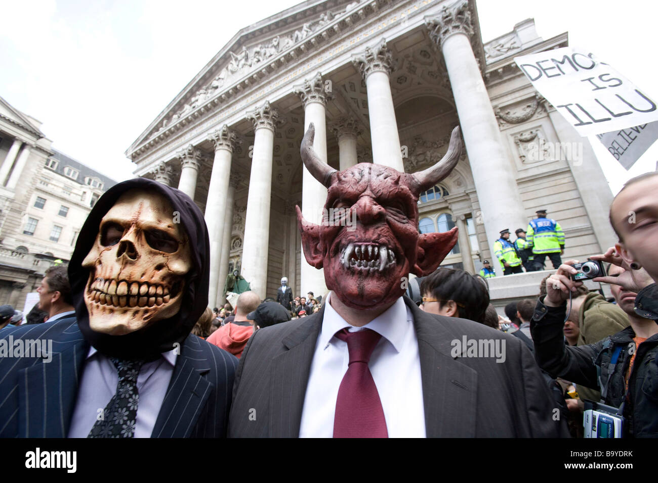 masked protesters infront of the Bank of England Stock Photo - Alamy