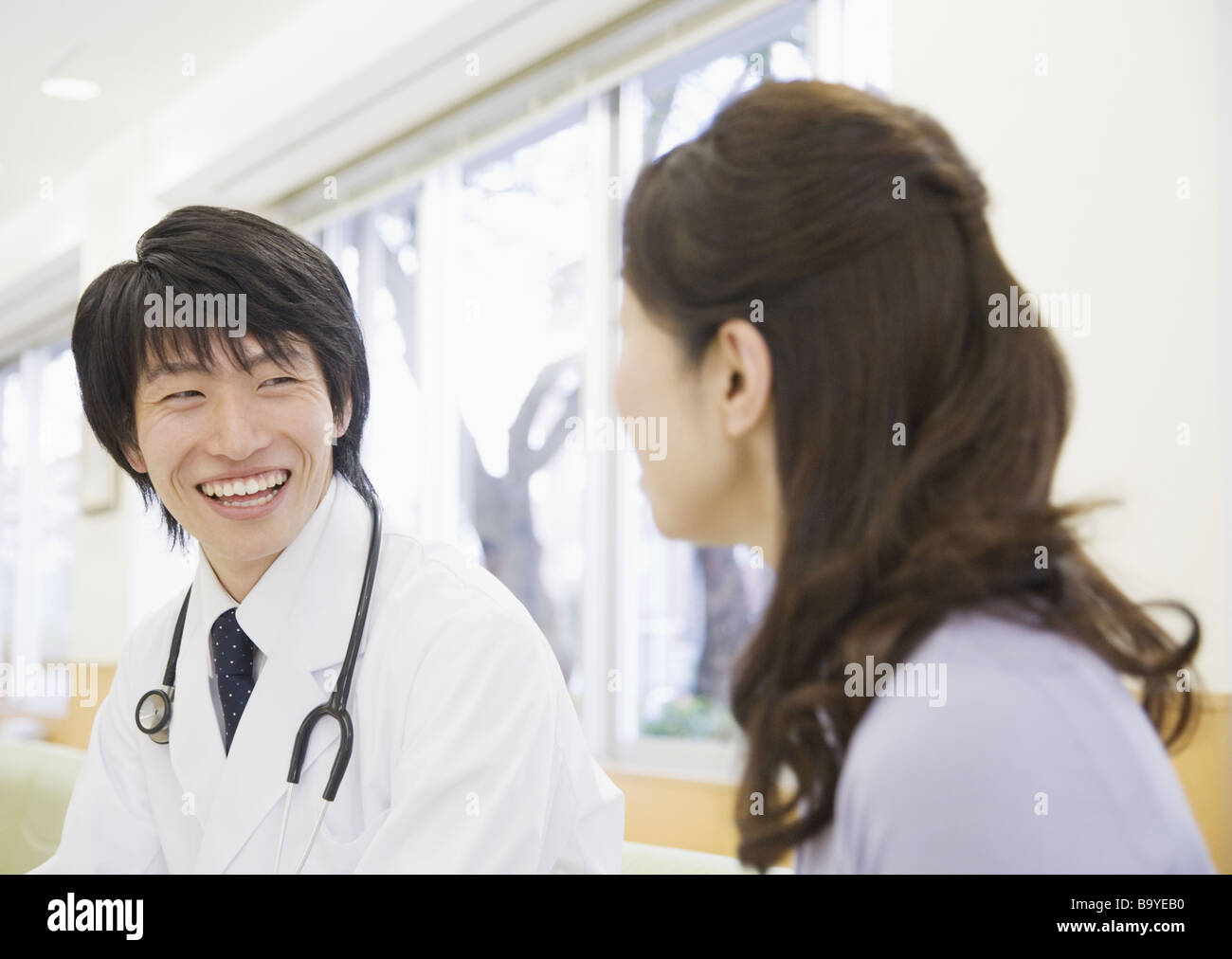 Doctor and patient Stock Photo - Alamy