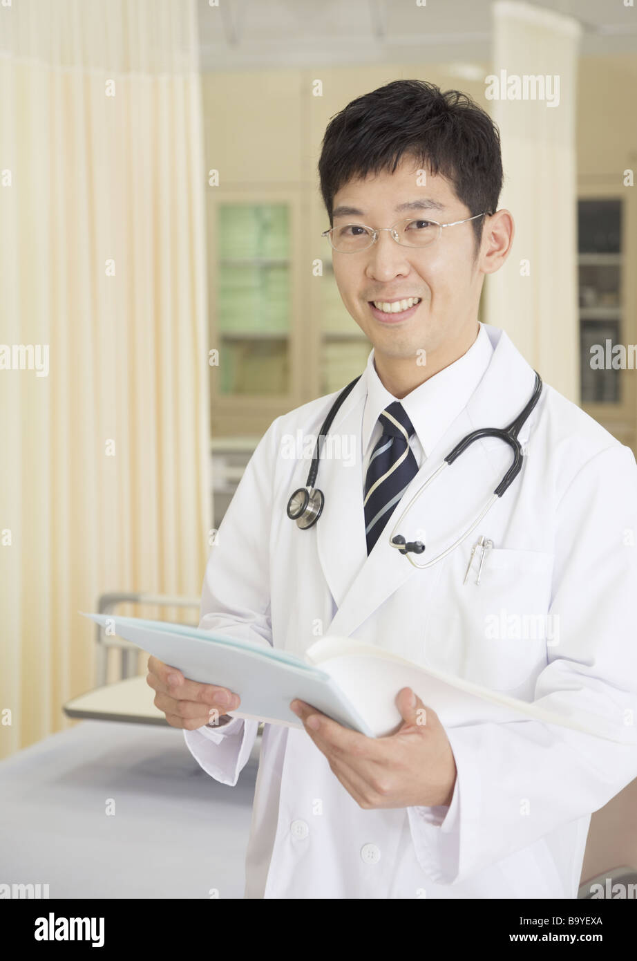 A smiling doctor Stock Photo - Alamy
