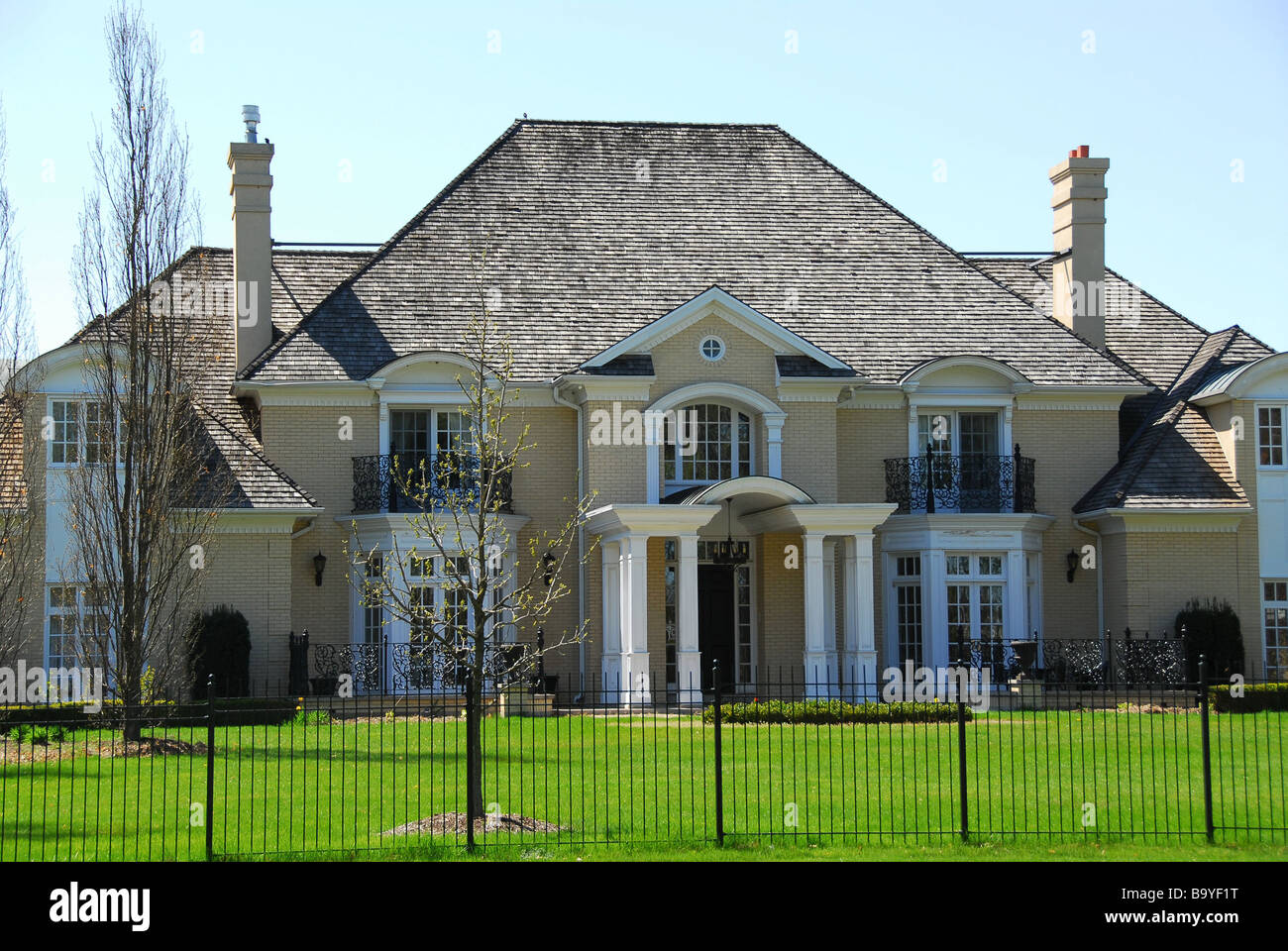 Luxury home in early spring Stock Photo - Alamy