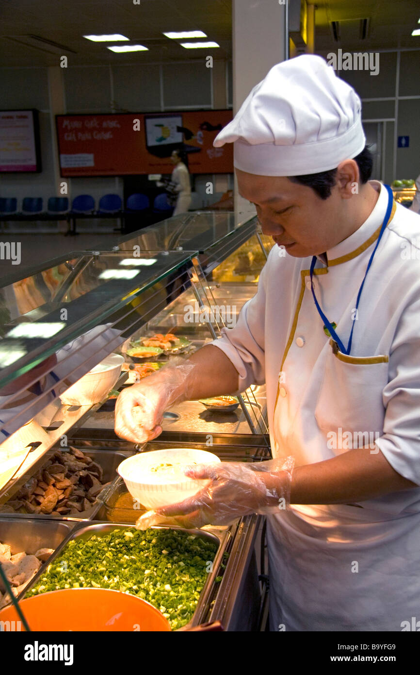Chef making Pho Vietnamese rice noodle soup in the Tan Son Nhat ...