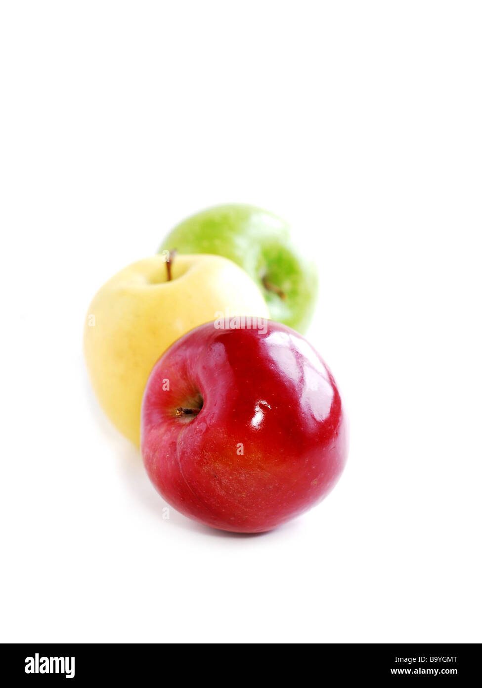 Three apples on white background in perspective green yellow and red ...