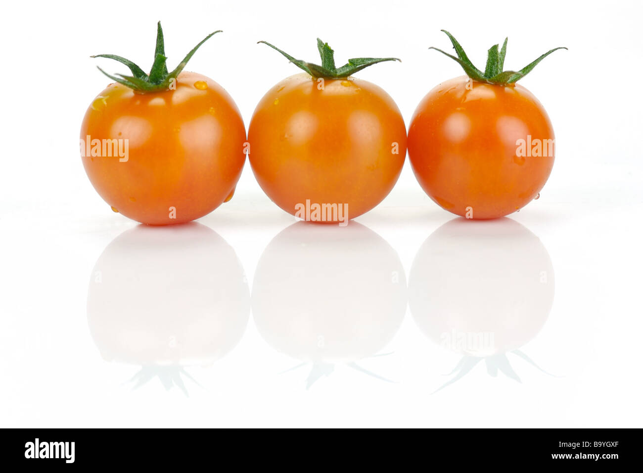 Cherry Truss Tomatoes isolated against a white background Stock Photo ...