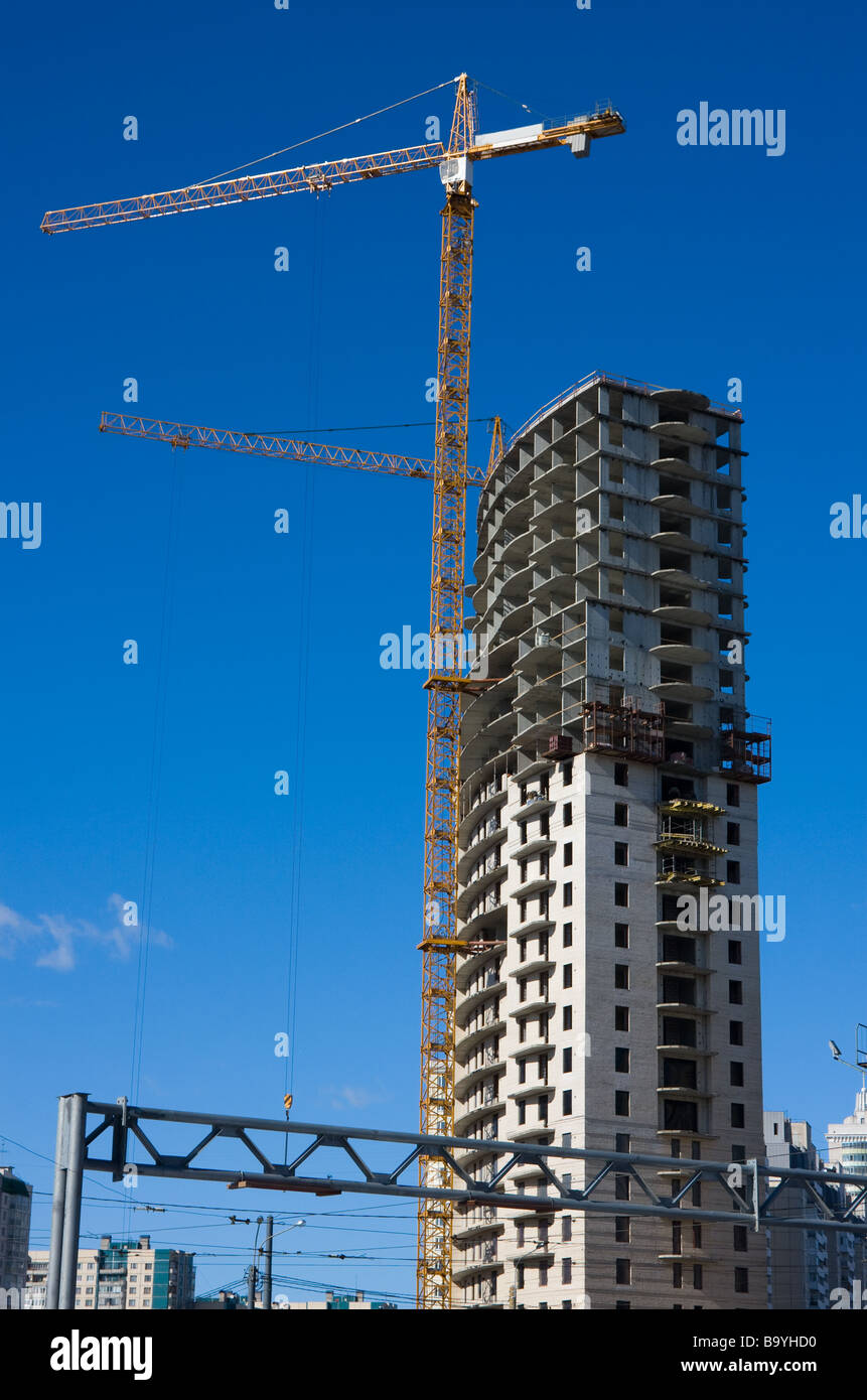 Building of a high rise block house on blue sky background Stock Photo ...