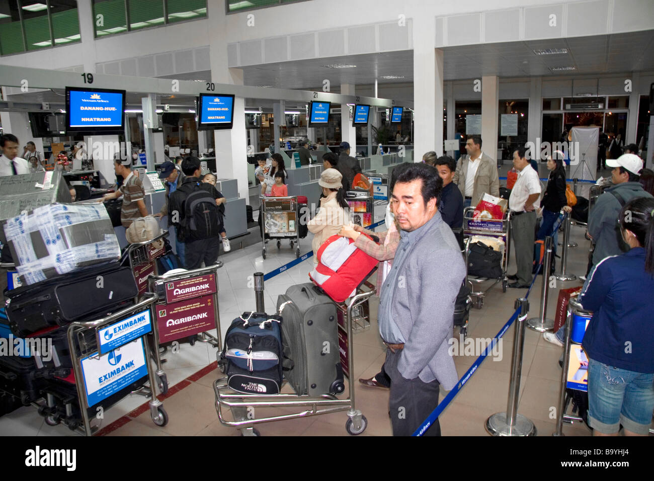 Domestic air passenger check in at the Tan Son Nhat International ...