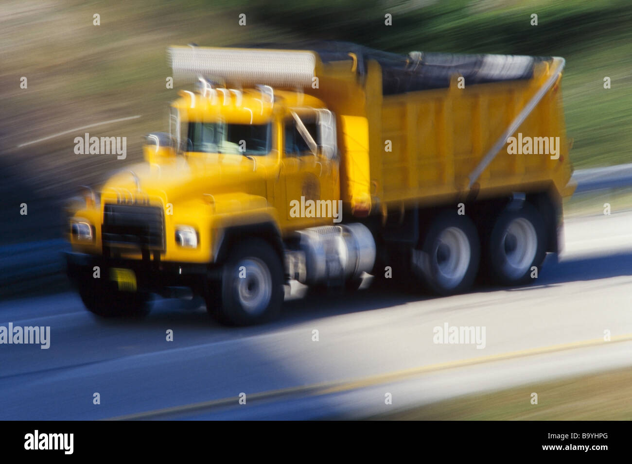 Semi Truck type vechiles, on road in motion Stock Photo - Alamy