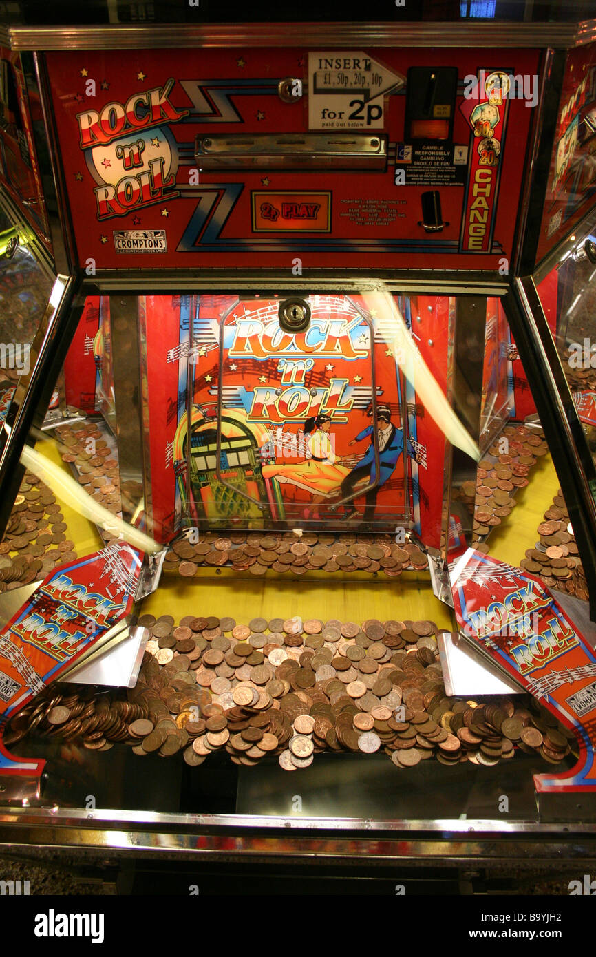 A Penny Amusement Game in an Arcade Stock Photo - Alamy