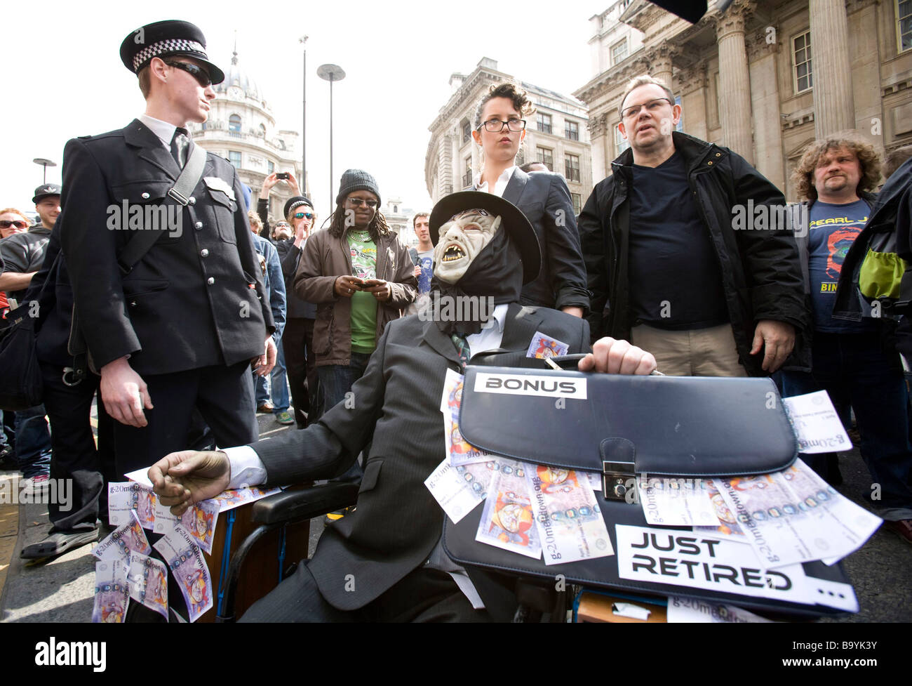 comedy troupe parady a fat greedy corrupt banker Stock Photo - Alamy