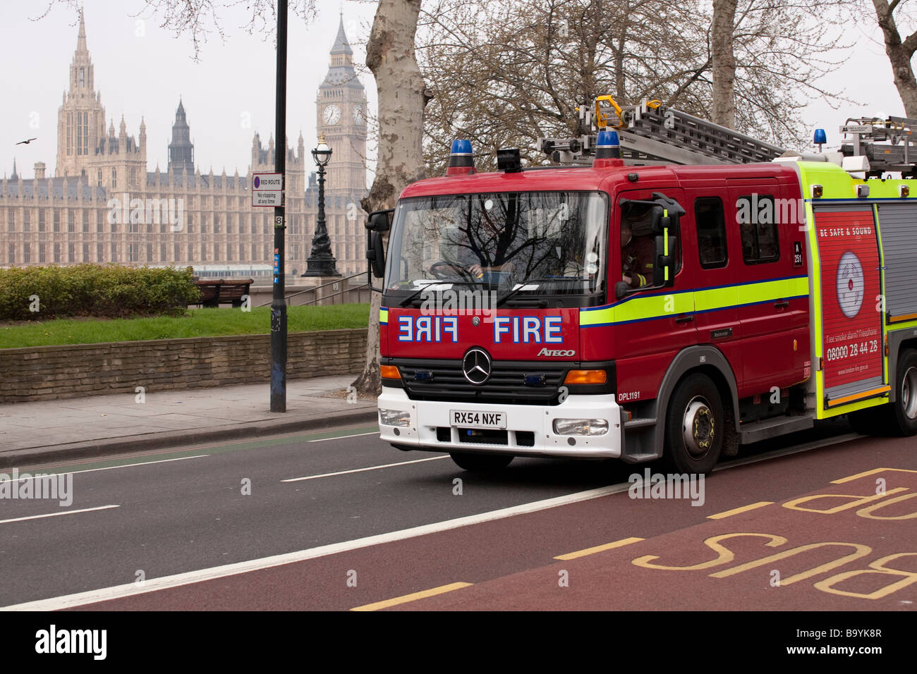London a fire engine speeds by UK Parliament Stock Photo - Alamy