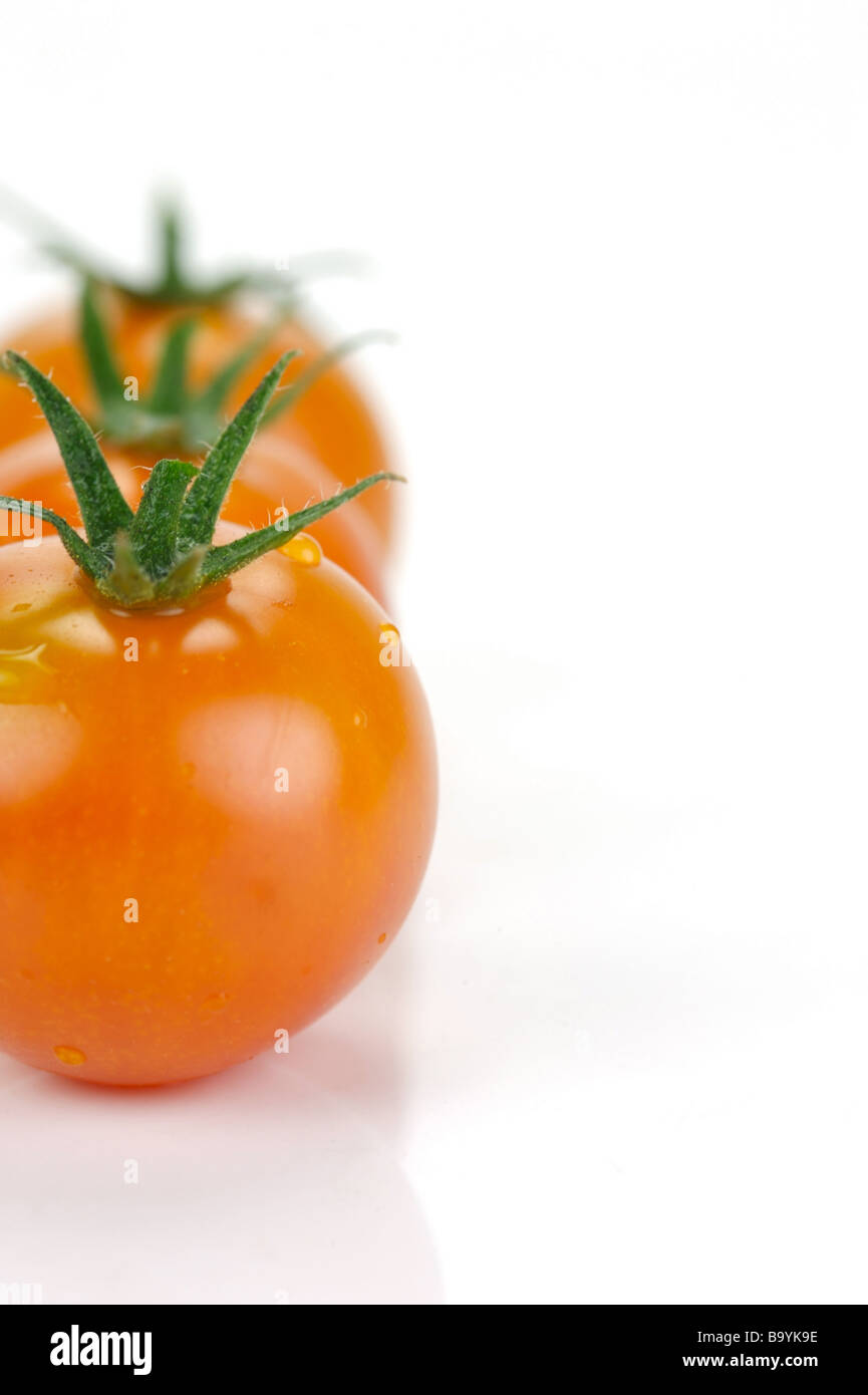Cherry Truss Tomatoes isolated against a white background Stock Photo ...