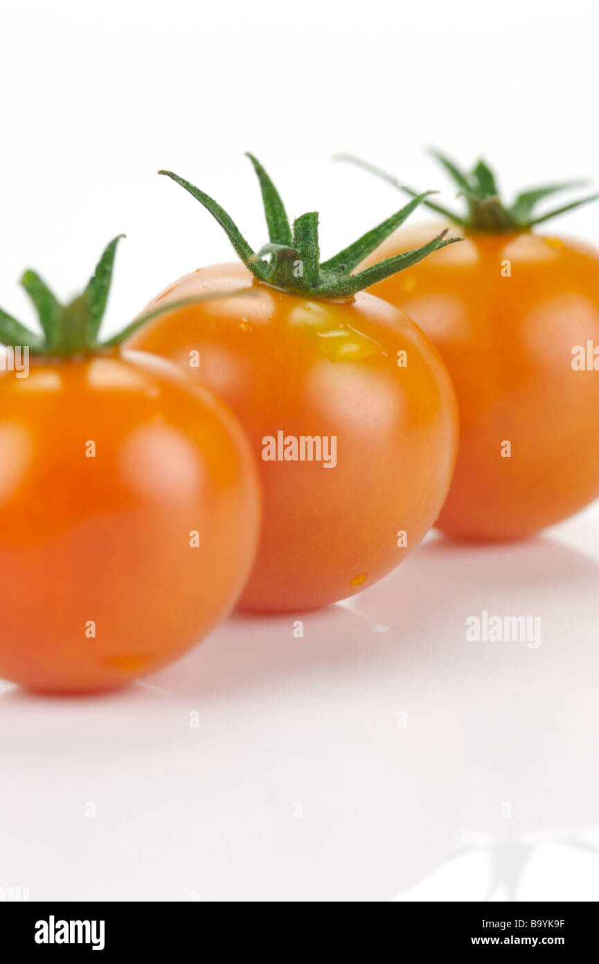 Cherry Truss Tomatoes isolated against a white background Stock Photo ...