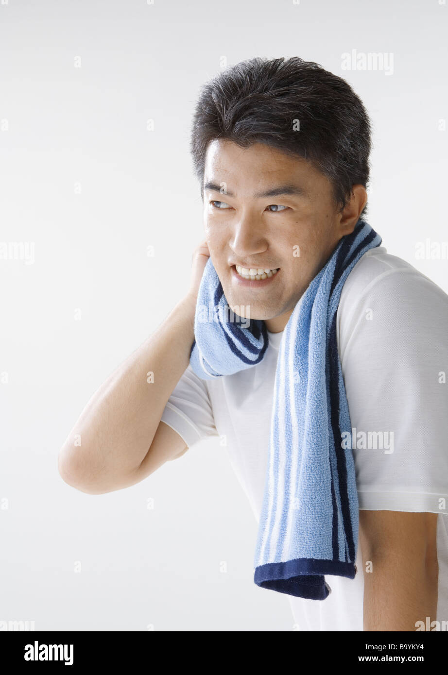 Man wiping face shirt hi-res stock photography and images - Alamy