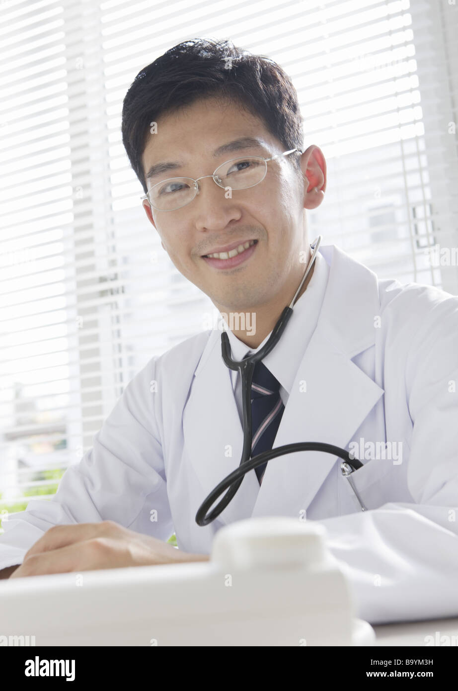 A smiling doctor Stock Photo - Alamy