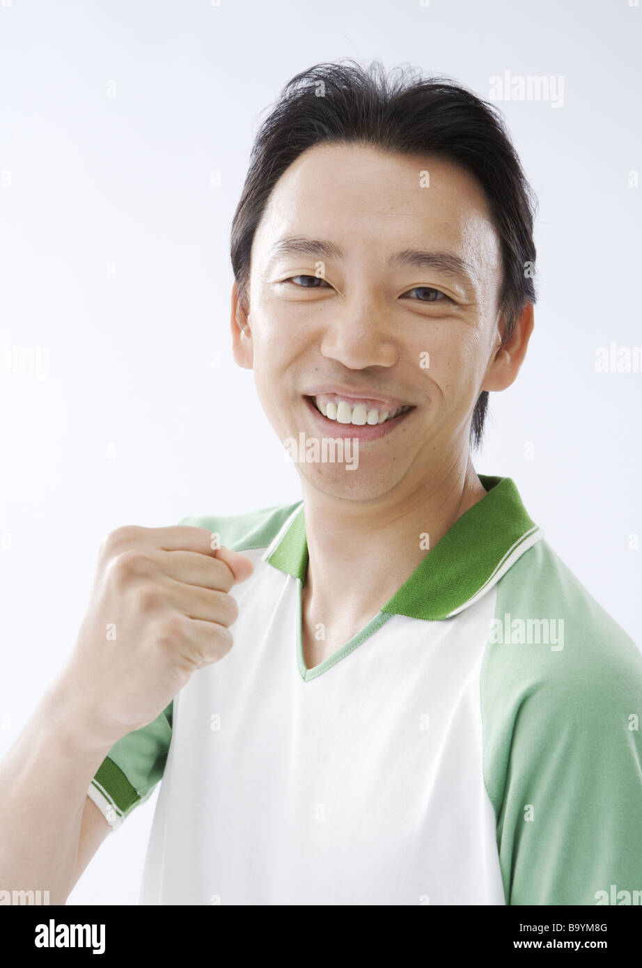 A man pumping his fist Stock Photo - Alamy