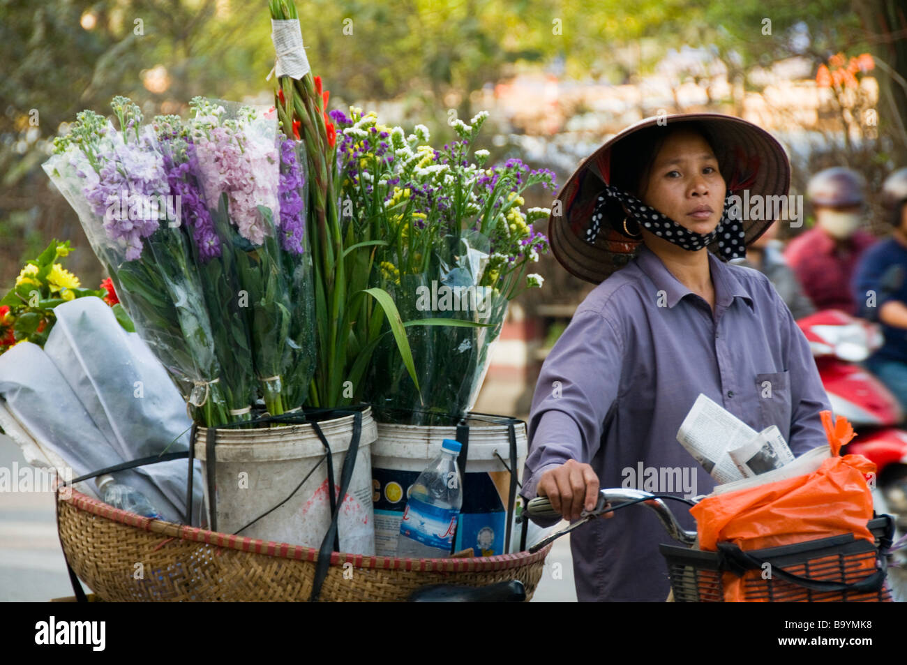 bicycle flower vendor in Hanoi Vietnam Stock Photo - Alamy