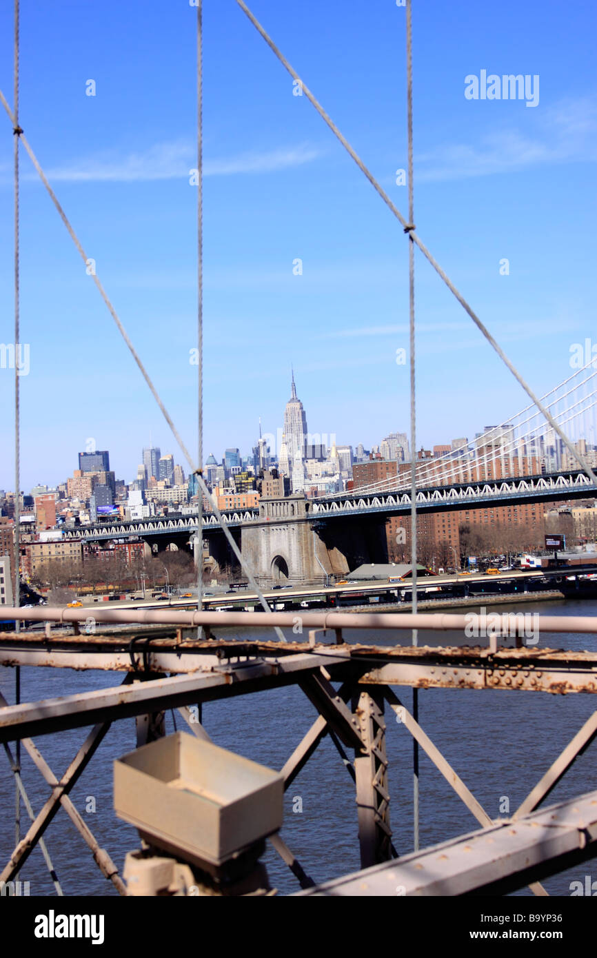The Empire State Building, as viewed through the suspension cables of ...