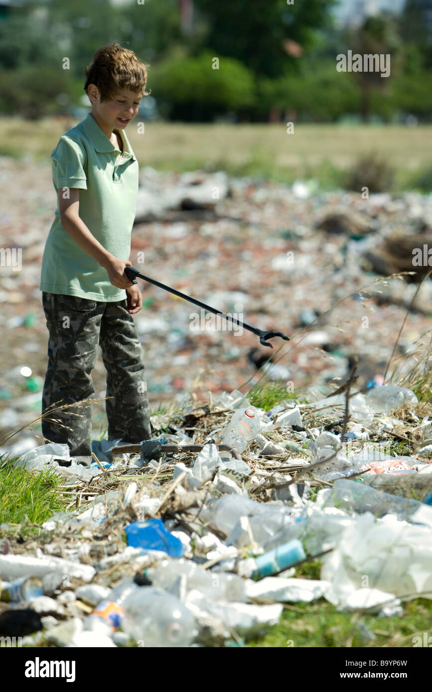 Picking up litter boys hi-res stock photography and images - Alamy