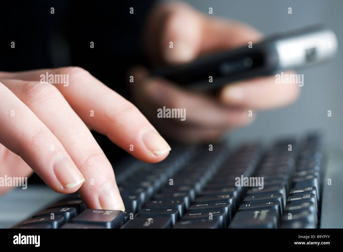 Female hands using computer keyboard Stock Photo - Alamy