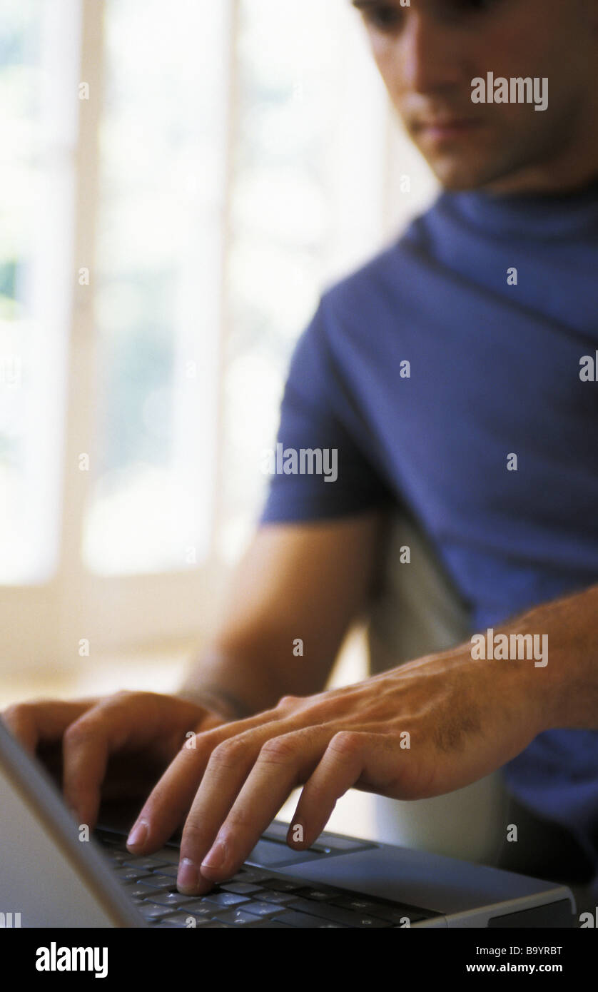 Partial view man typing hi-res stock photography and images - Alamy
