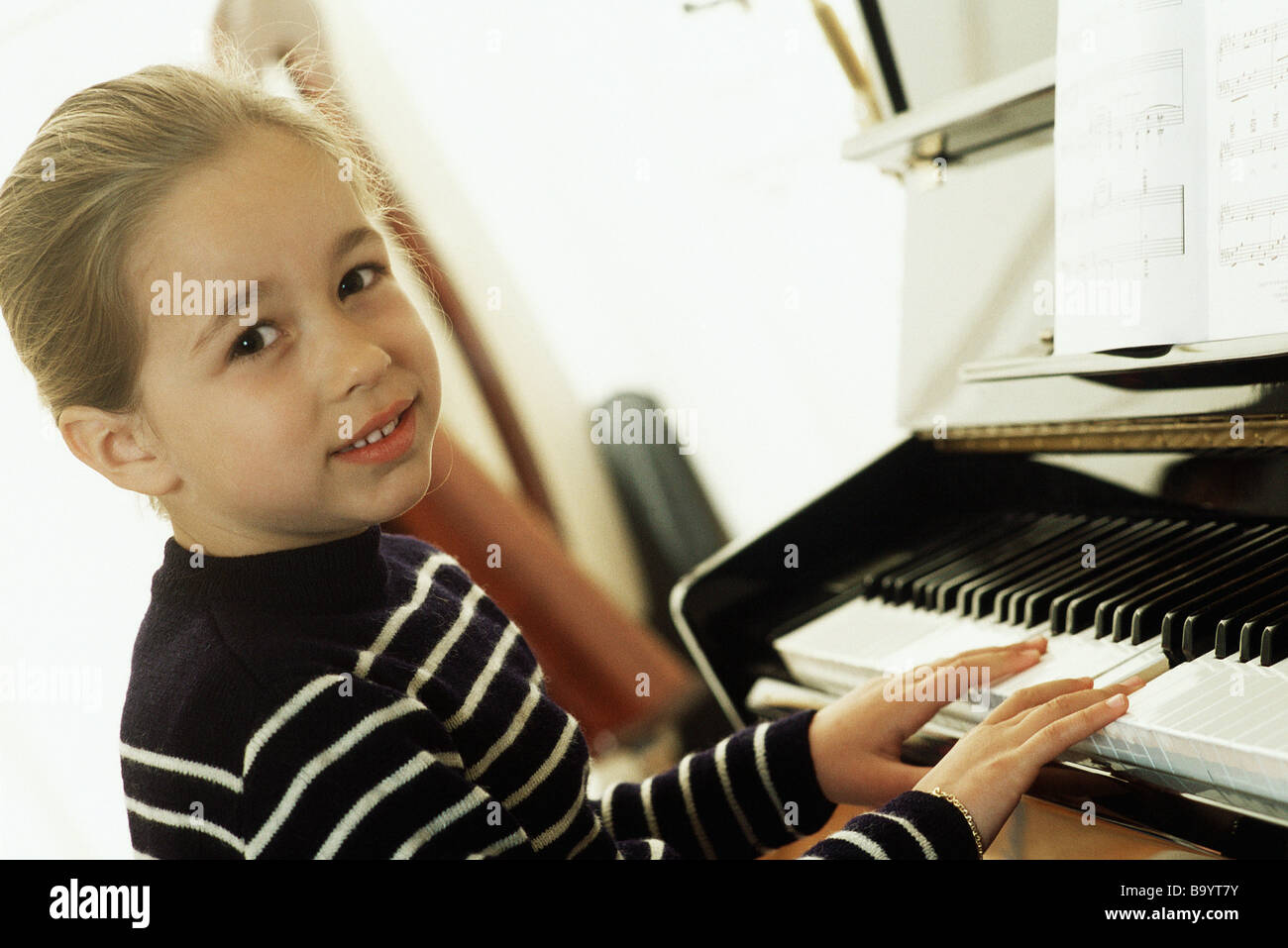 Girl Playing Piano Back View High Resolution Stock Photography and ...