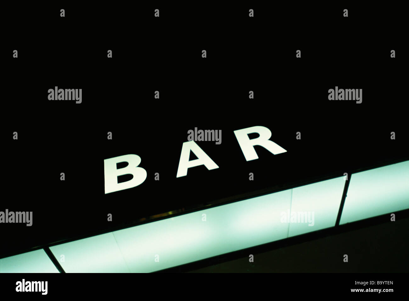 Illuminated bar sign Stock Photo - Alamy