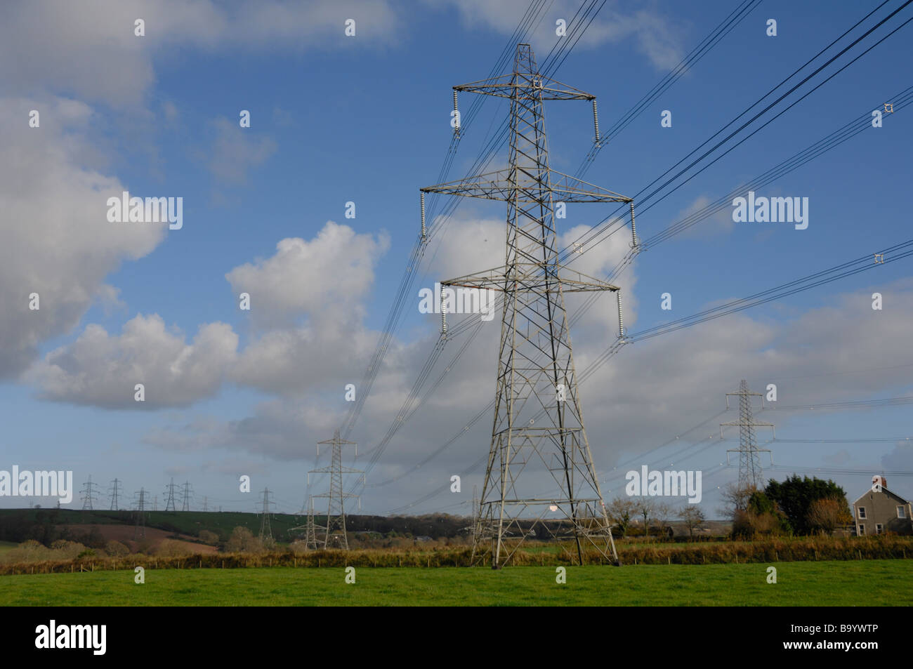 Overhead electricity power cables and pylons Pembrokeshire Wales UK ...