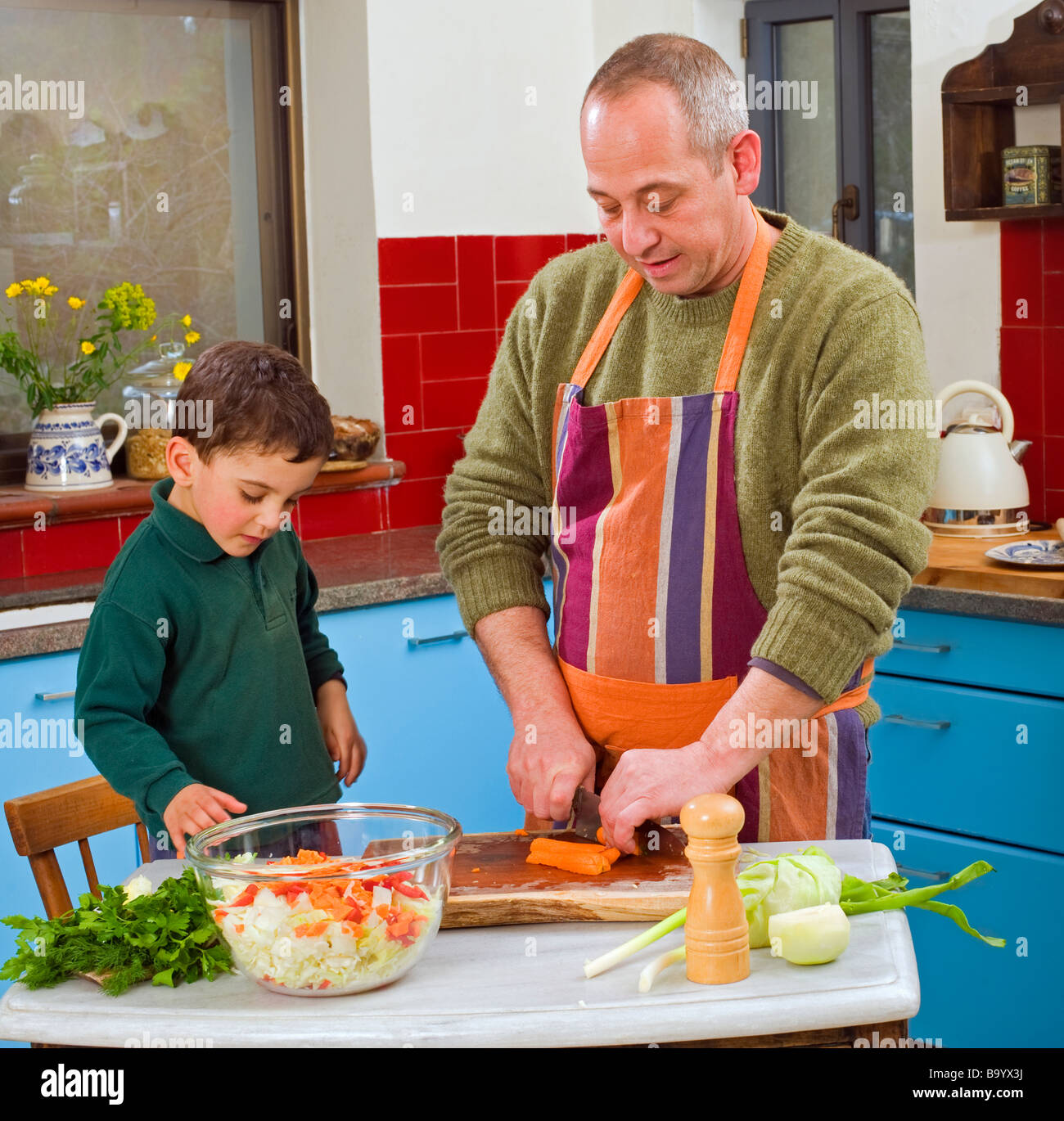 father and child cooking in the kitchen together Stock Photo - Alamy