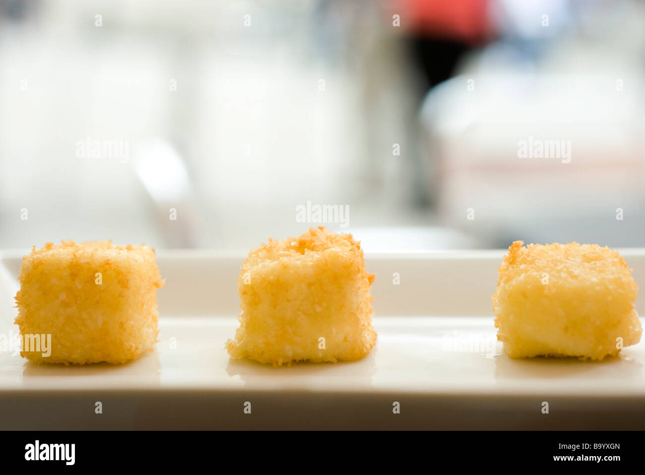 Cubes of fried cheese, close-up Stock Photo - Alamy