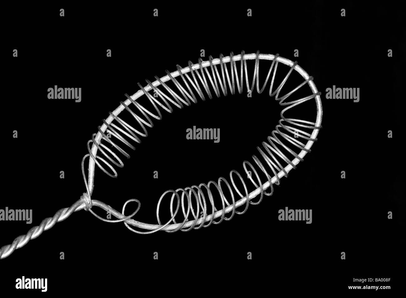 An antique wire spoon Stock Photo - Alamy