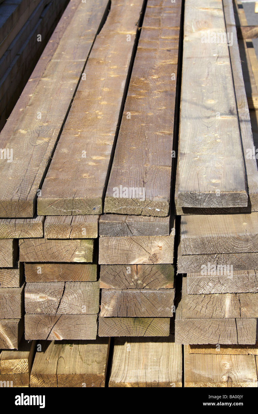 wood and timber in a builders yard Stock Photo - Alamy