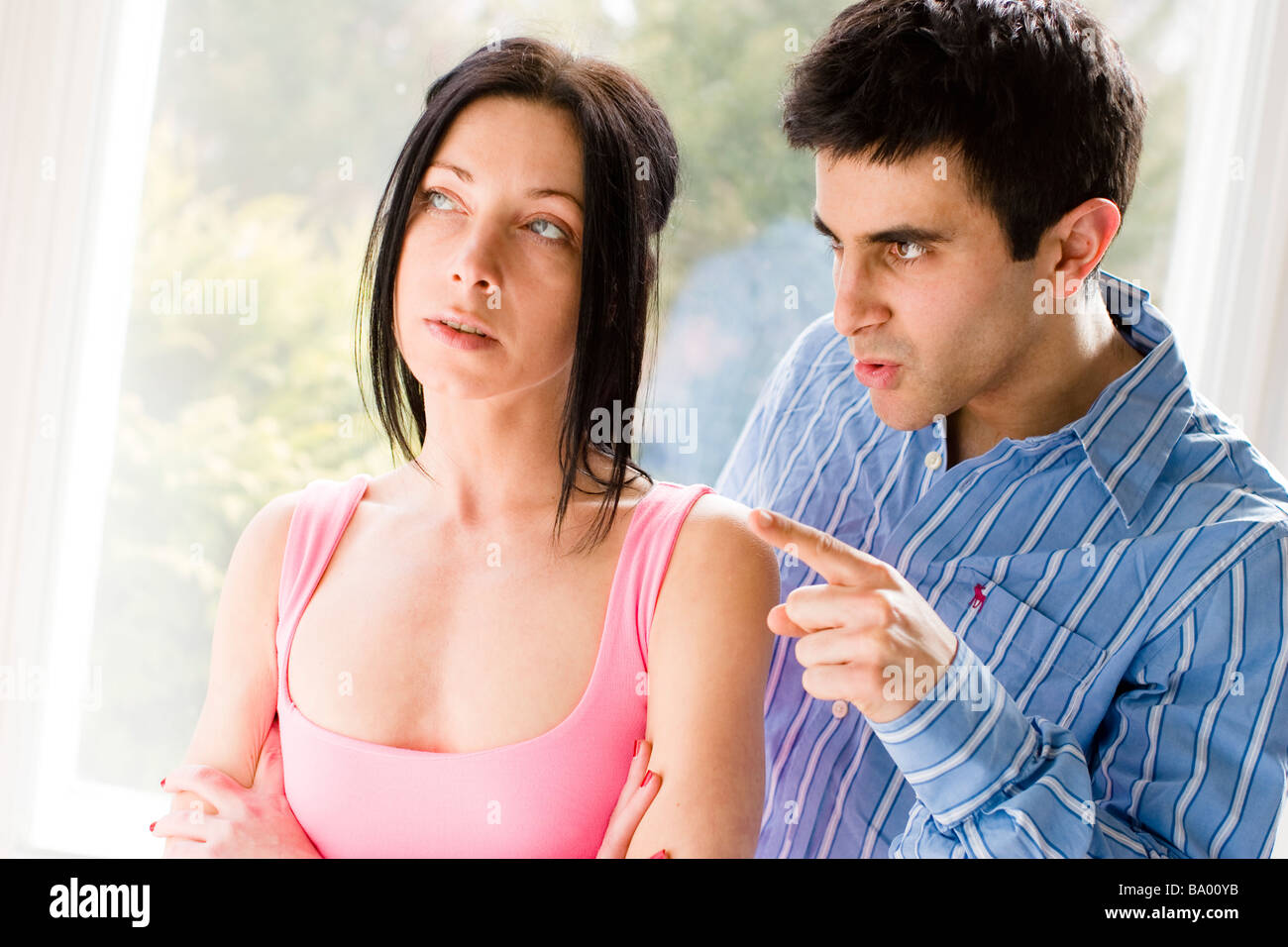 Man arguing with partner Stock Photo - Alamy