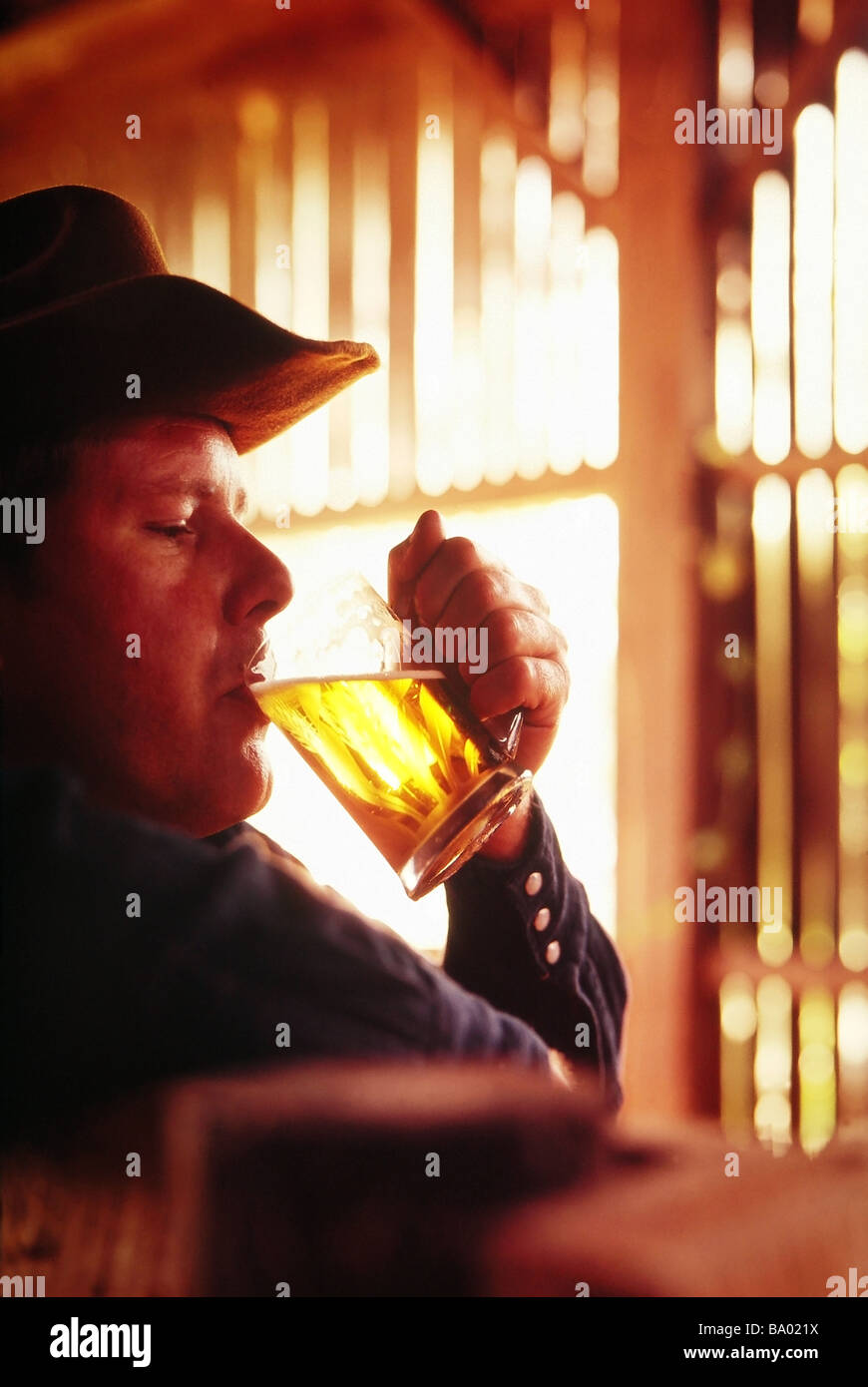 Cowboy drinking beer hi-res stock photography and images - Alamy