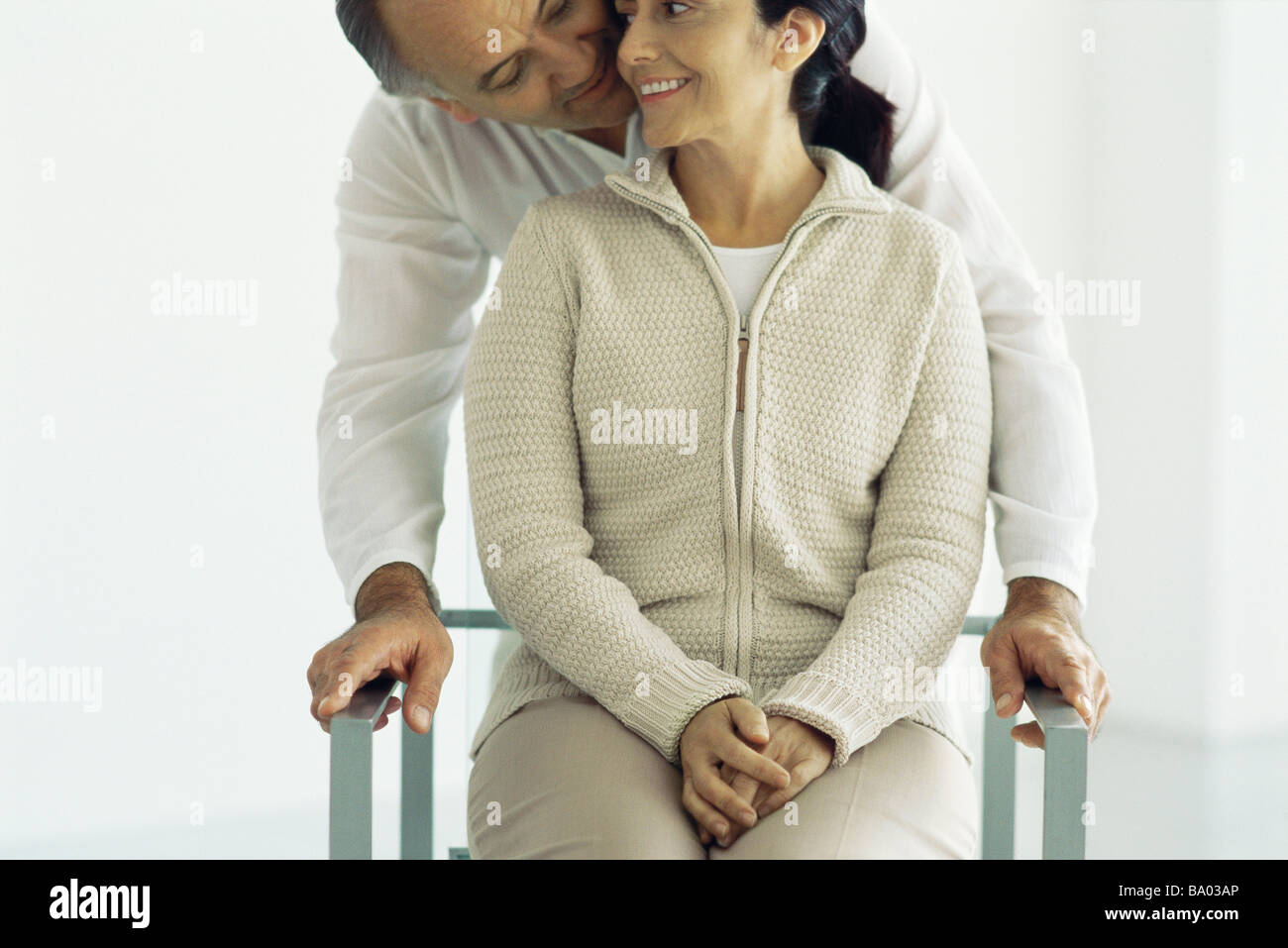 Leaning forward in chair hi-res stock photography and images - Alamy