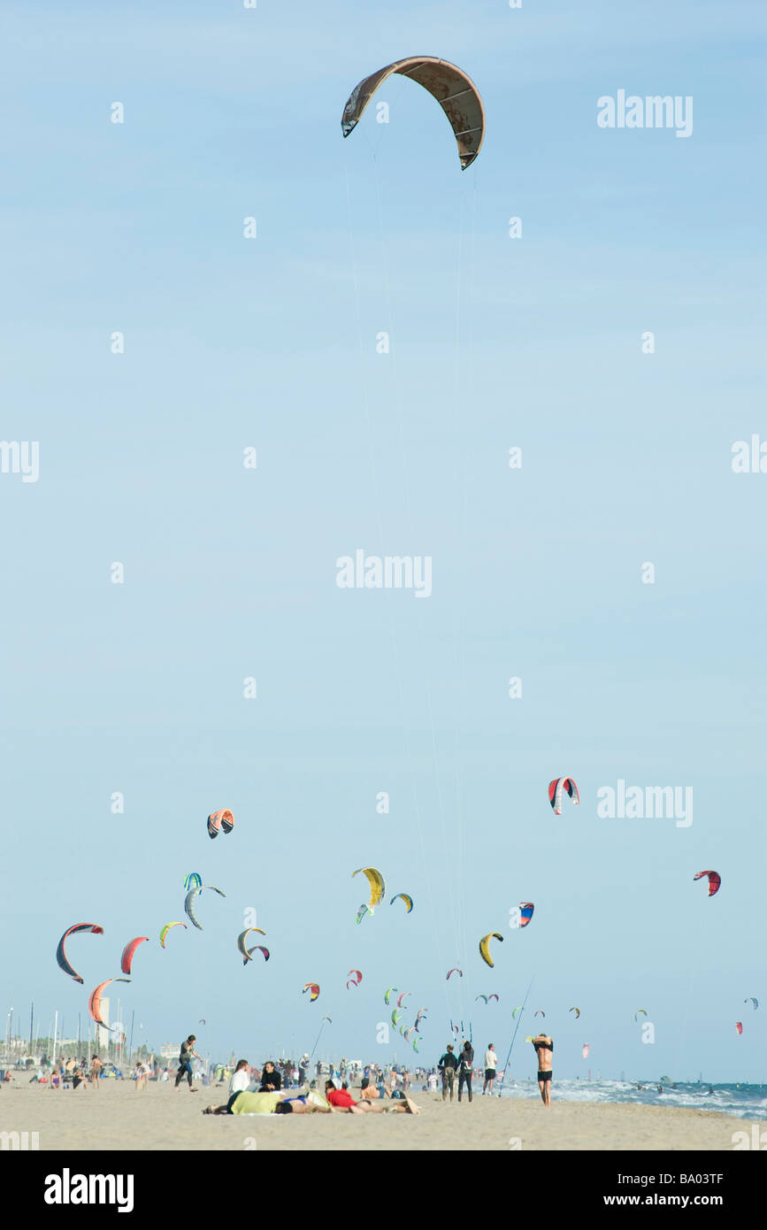 Kitesurfers on beach Stock Photo - Alamy