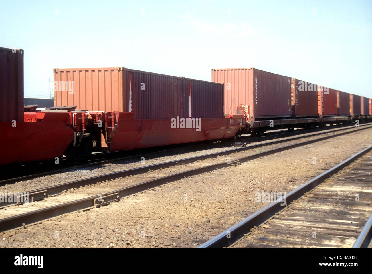 Train Hauling Shipping Containers Stock Photo - Alamy