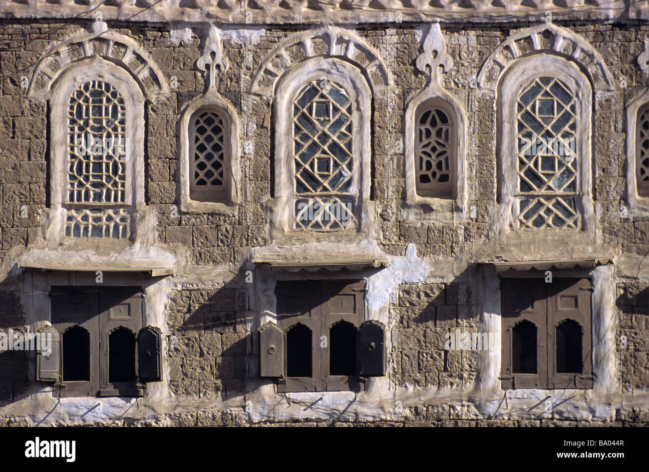 Triple Decorated Windows & Shutters of an Adobe Mud Brick Tower House ...