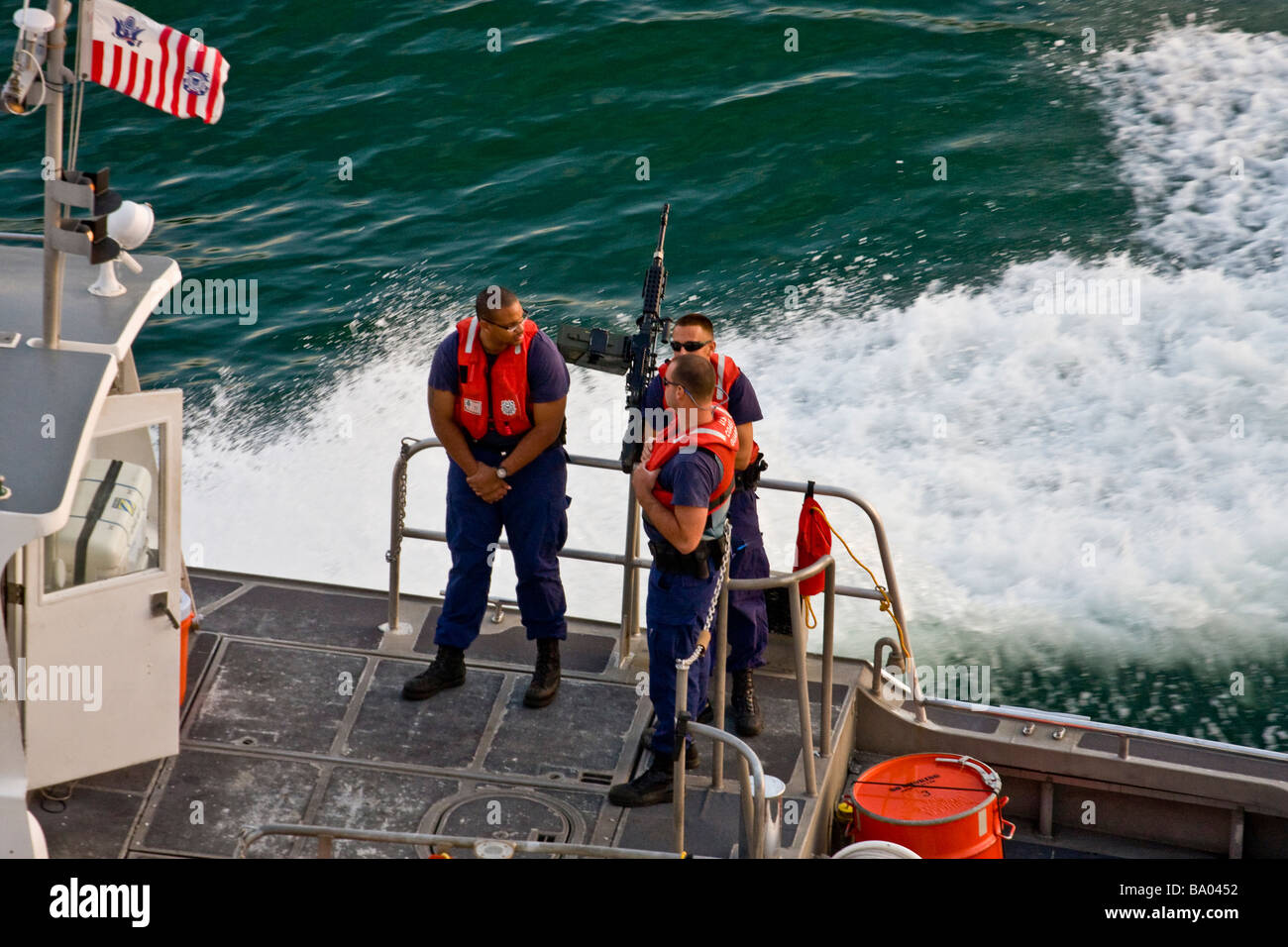 Coast Guard with Automatic Weapons Stock Photo - Alamy