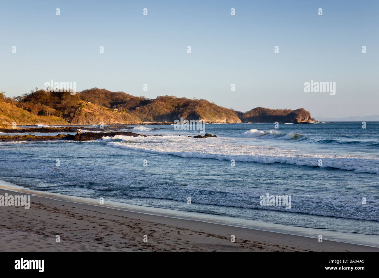 Waves washing on the shore at sunset on Playa Marsella, Nicaragua Stock ...