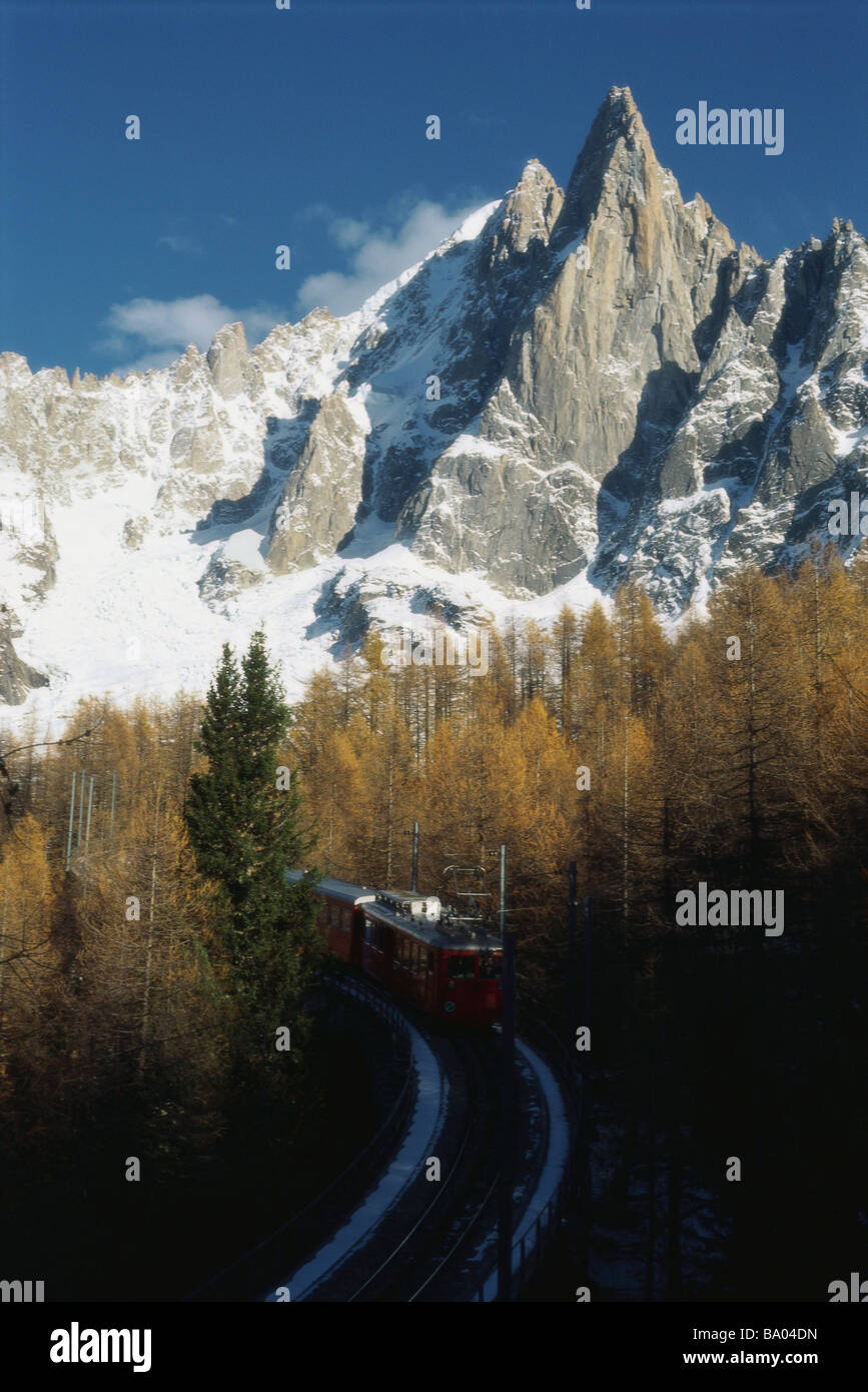 Train moving through the alps Stock Photo - Alamy